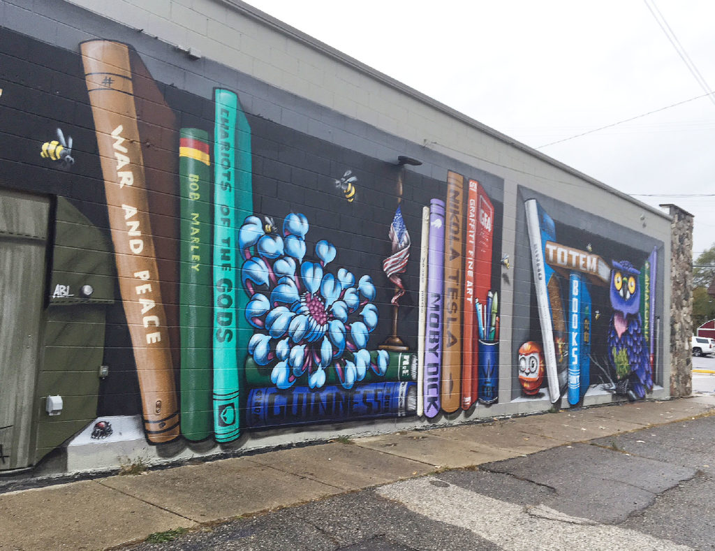 International and local artists collaborate to brighten bookstore’s ...