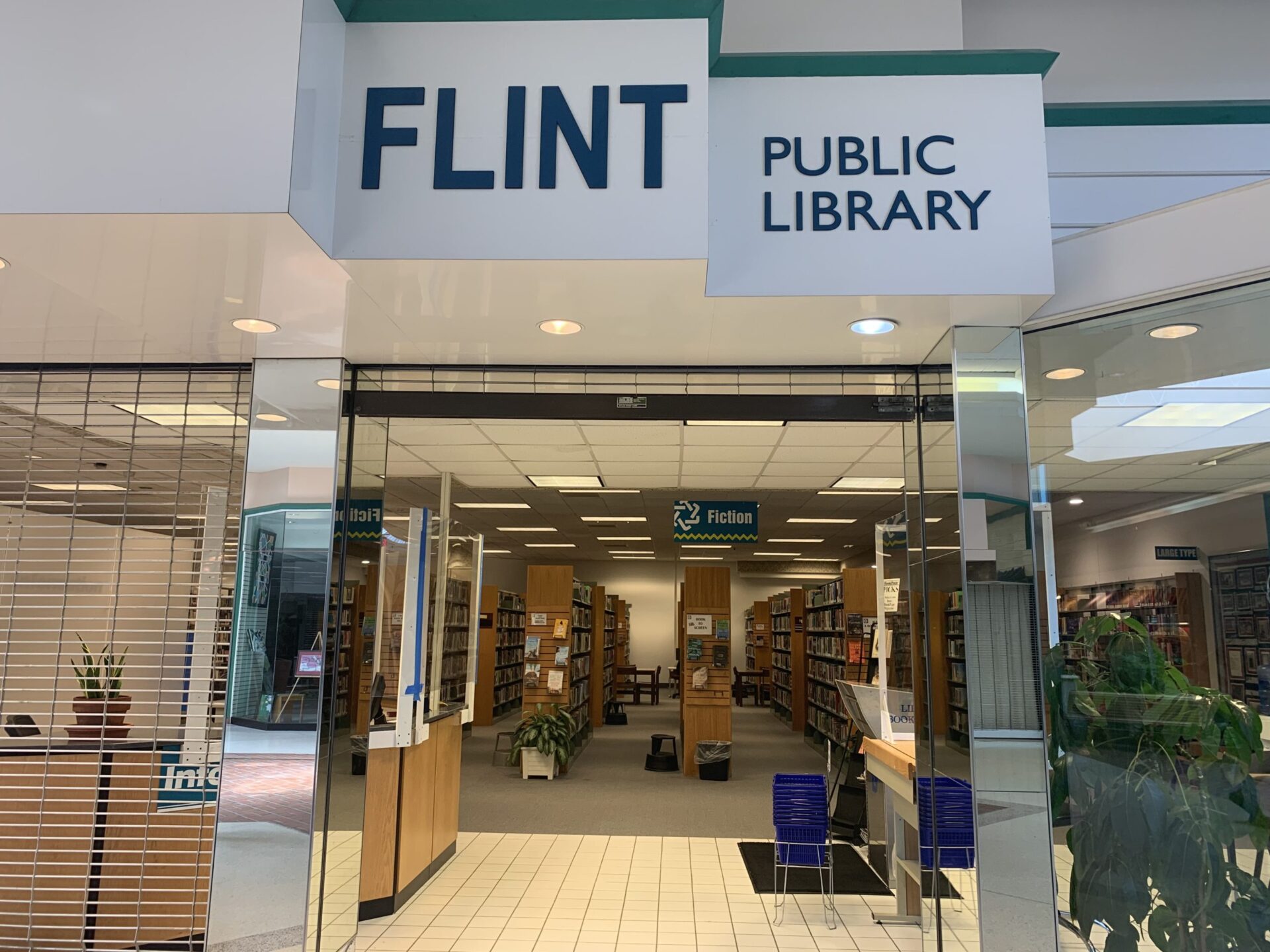 Flint Public Library opens in temporary quarters with COVID precautions ...